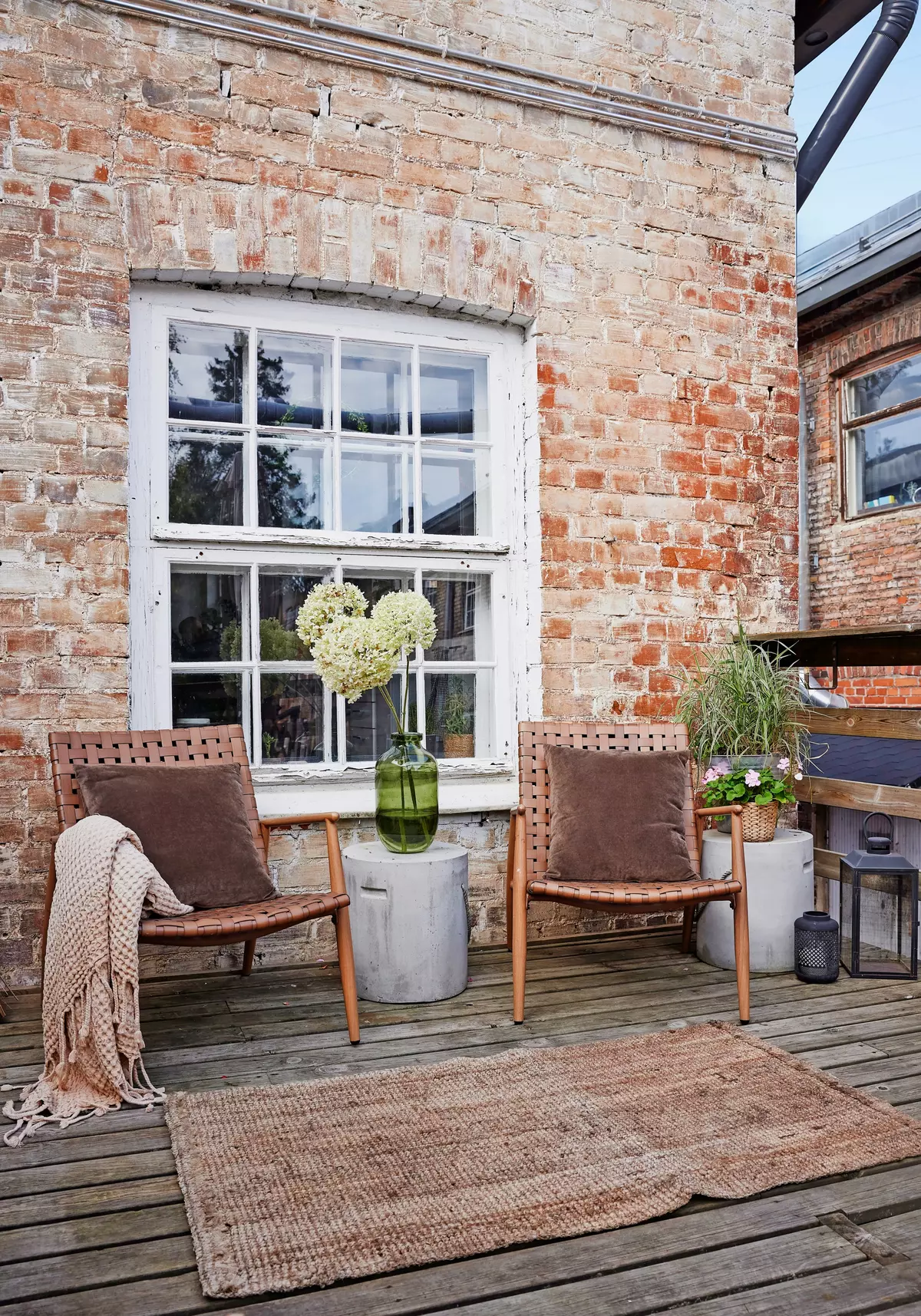 A Finnish Factory-Turned-Home with Leather Sofas and Handmade Ceramics